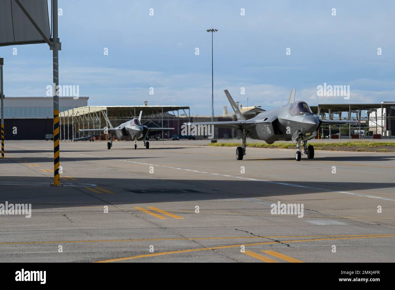 U.S. Air Force F-35A Lightning II aircraft taxi through the flightline ...