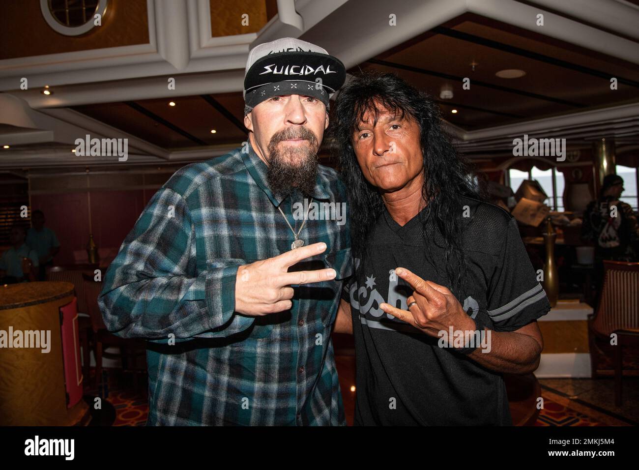 Mike "Cyco Miko" Muir, left, and Joey Belladonna pose on board the ...