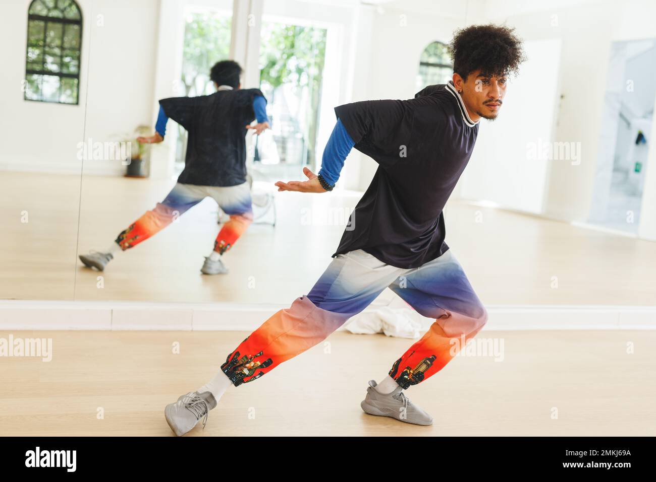 Image of biracial male hip hop dancer practicing at dance studio. Dance ...