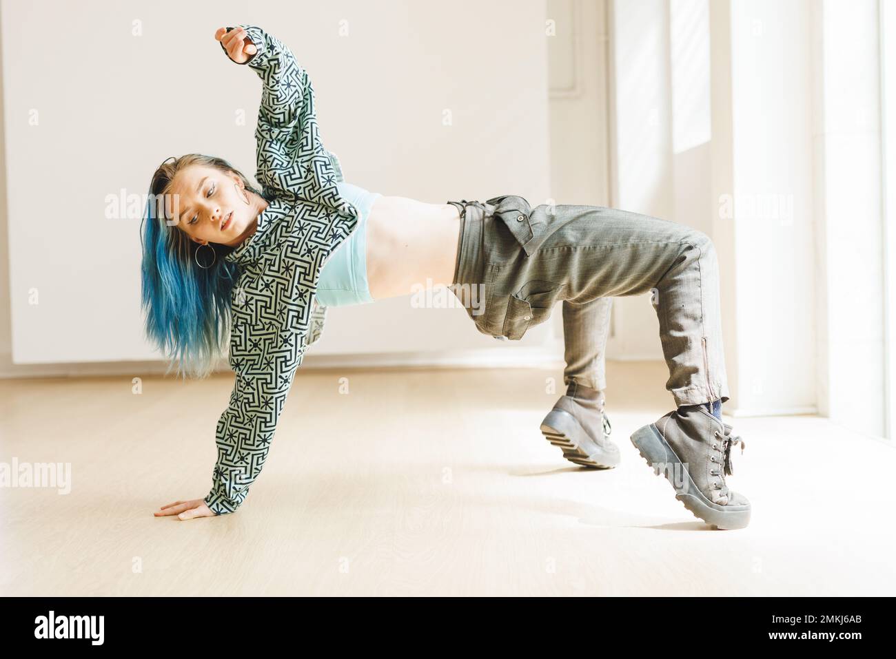 Image of caucasian female hip hop dancer practicing at dance studio ...