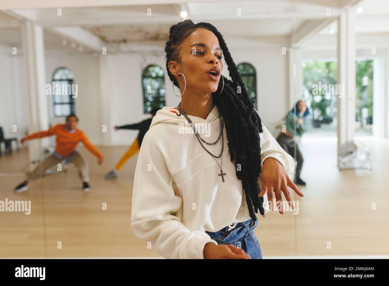 Image of african american female hip hop dancer practicing in studio ...