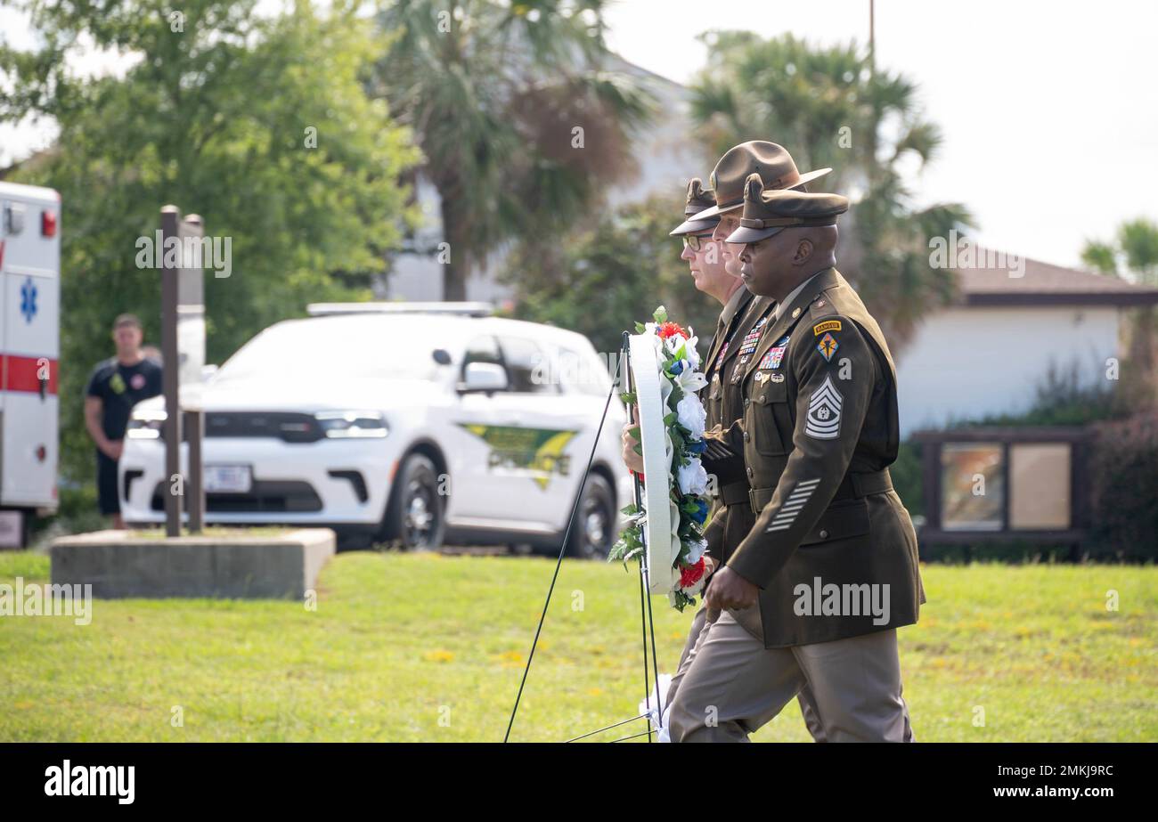 Post Command Sgt. Maj. Philson Tavernier and Col. Mark E. Huhtanen ...
