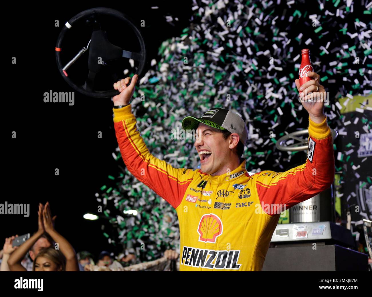 FILE- In this Nov. 18, 2018, file photo Joey Logano waves his steering ...