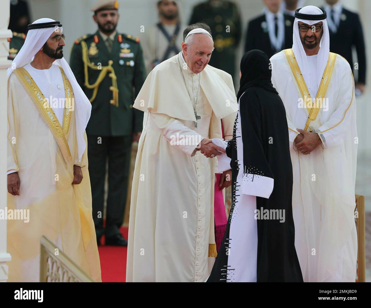 Pope Francis shakes hands with Amal Al Qubaisi, the President of the UAE Federal National ...