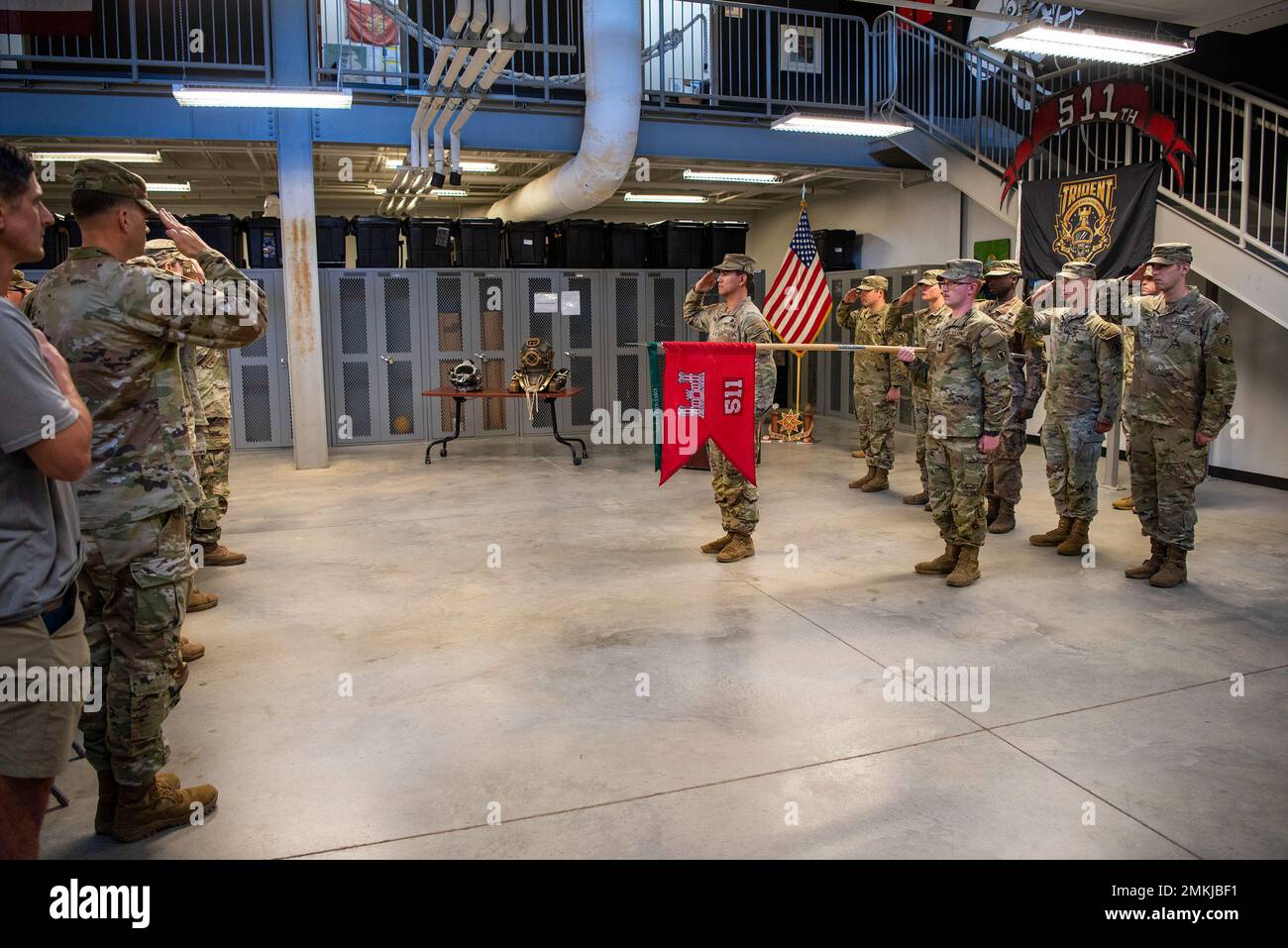 U.S. Army divers of the 511th Engineer Dive Detachment render honors during a pre-deployment ...