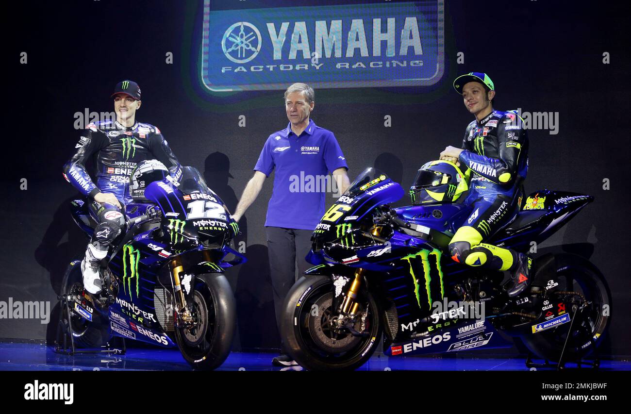 Yamaha Motor Racing Managing Director Lin Jarvis, center, poses with ...