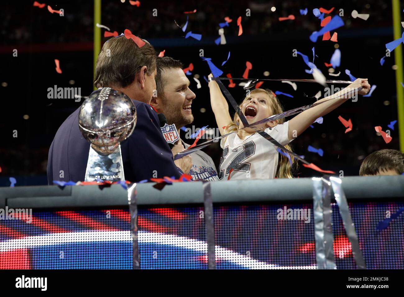 New England Patriots' Tom Brady holds his daughter Vivian, after the ...