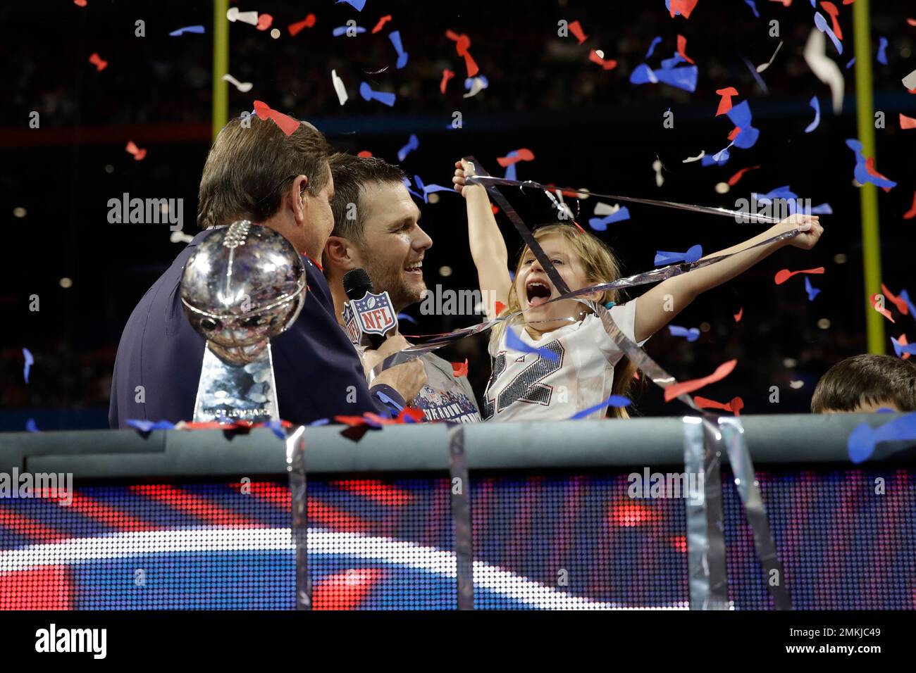 New England Patriots' Tom Brady holds his daughter Vivian, after the ...