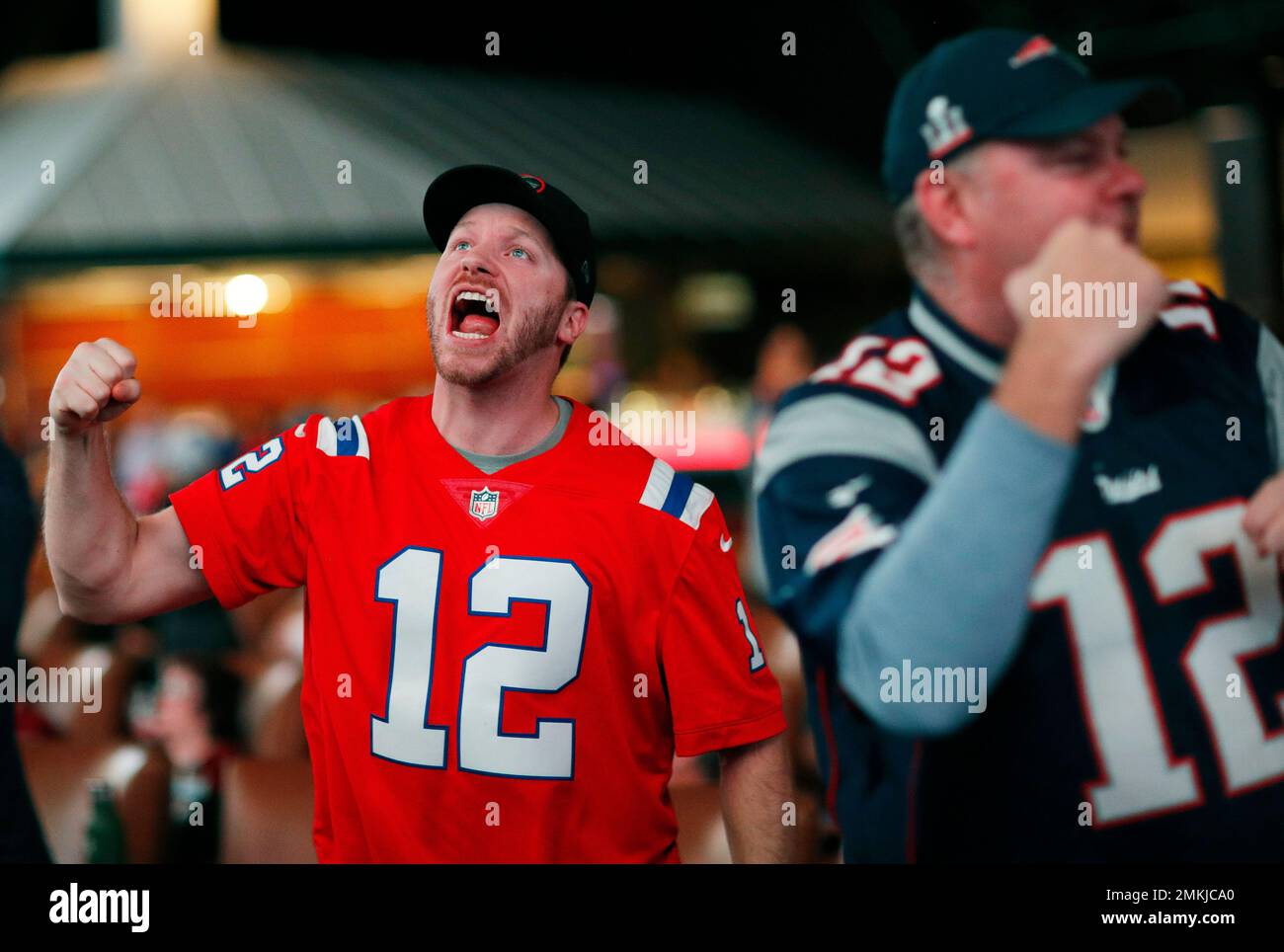 Darin Smith, right, and Derrick Chapman celebrate while watching Super ...