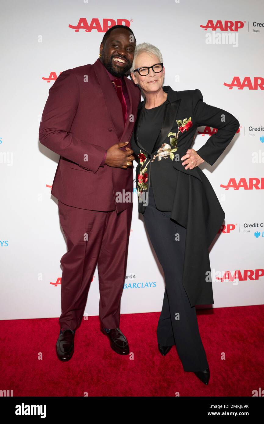 Brian Tyree Henry, left, and Jamie Lee Curtis arrive at AARP's 21st ...