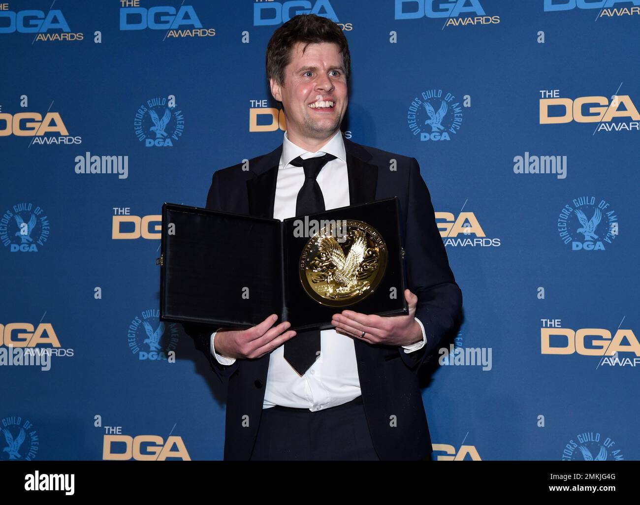 Jack Jameson poses in the press room with the award for outstanding ...