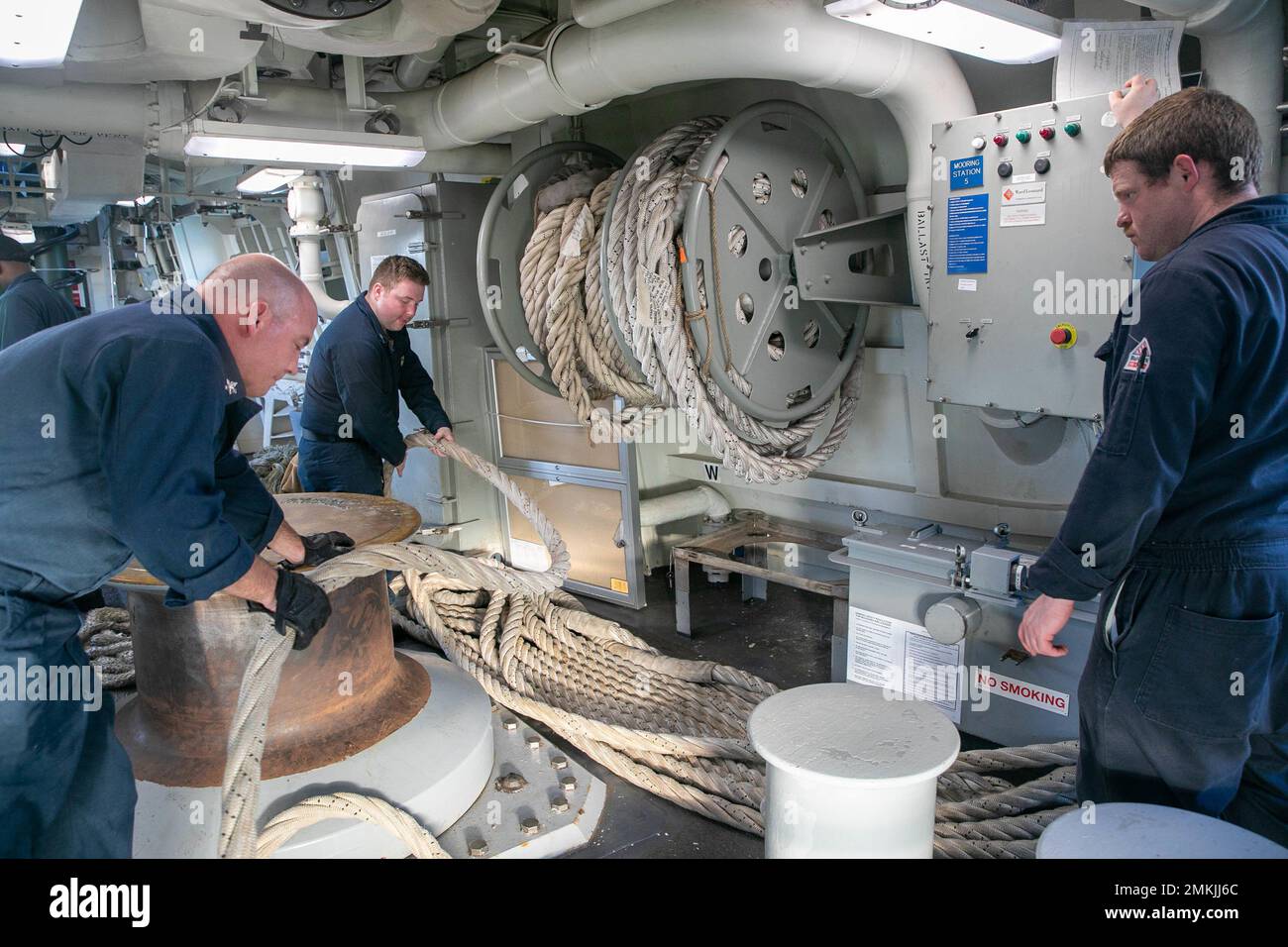 NAVAL BASE GUAM (Sept. 9, 2022) – Sailors handle line in preparation to ...