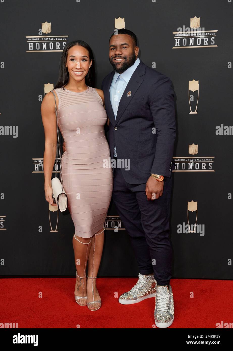 Mark Ingram Jr. of the New Orleans Saints, right, and Chelsea Peltin ...