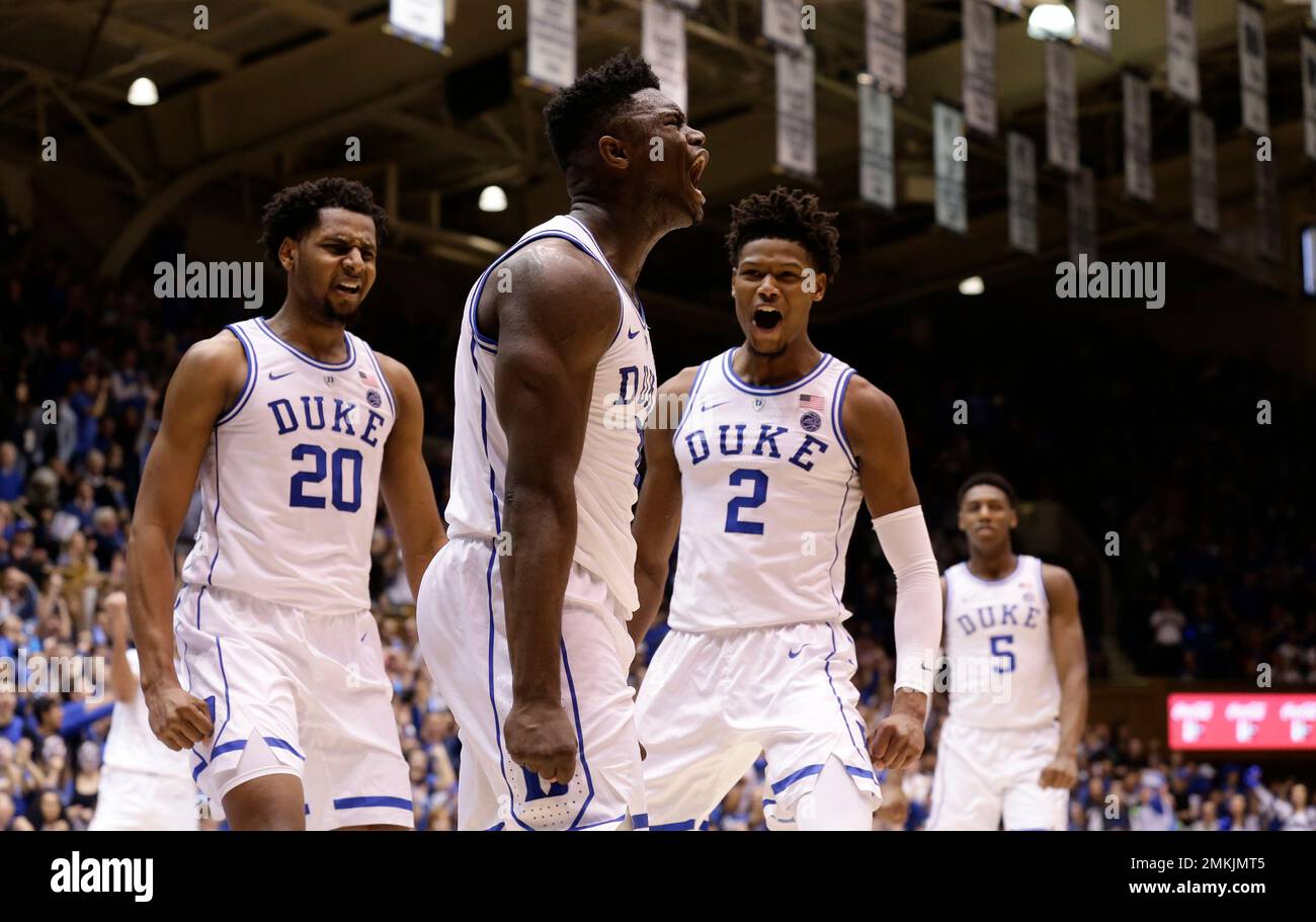 Duke's Zion Williamson (1) reacts with Marques Bolden (20) and Cam ...