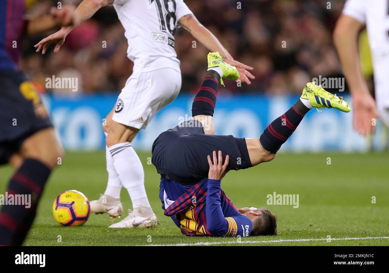 FC Barcelona's Lionel Messi falls during the Spanish La Liga soccer ...