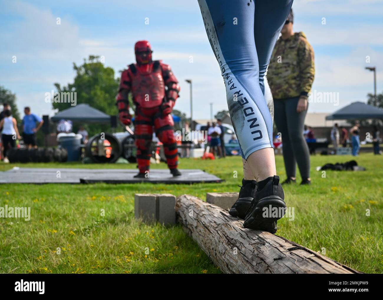 A service member assigned to Shaw Air Force Base completes an obstacle ...