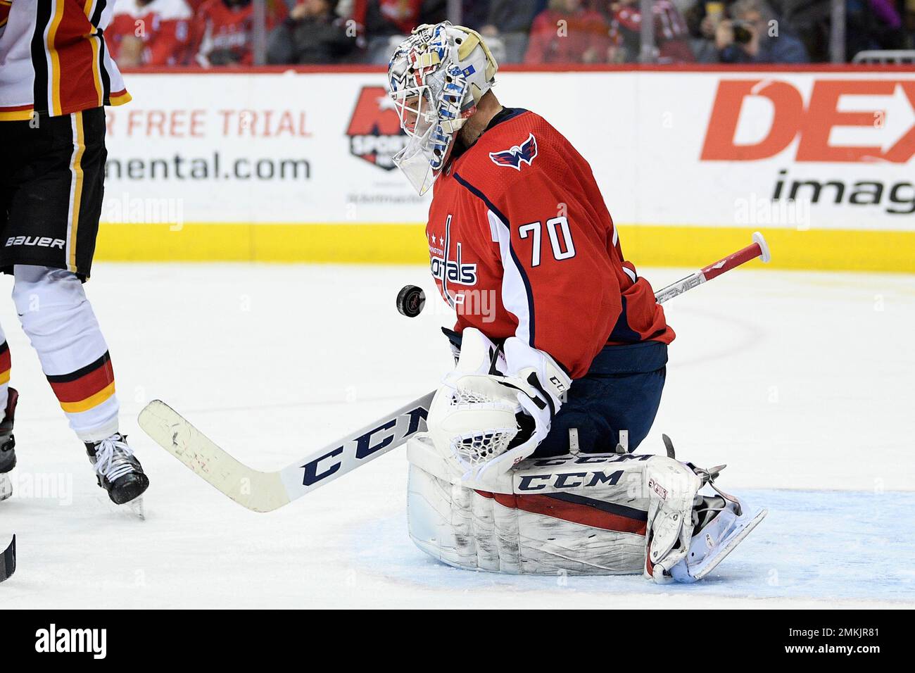 Washington Capitals goaltender Braden Holtby (70) stops the puck during ...