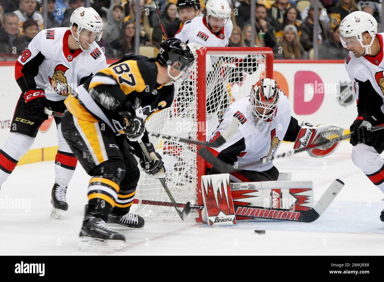 Pittsburgh Penguins' Sidney Crosby (87) shoots on Ottawa Senators ...