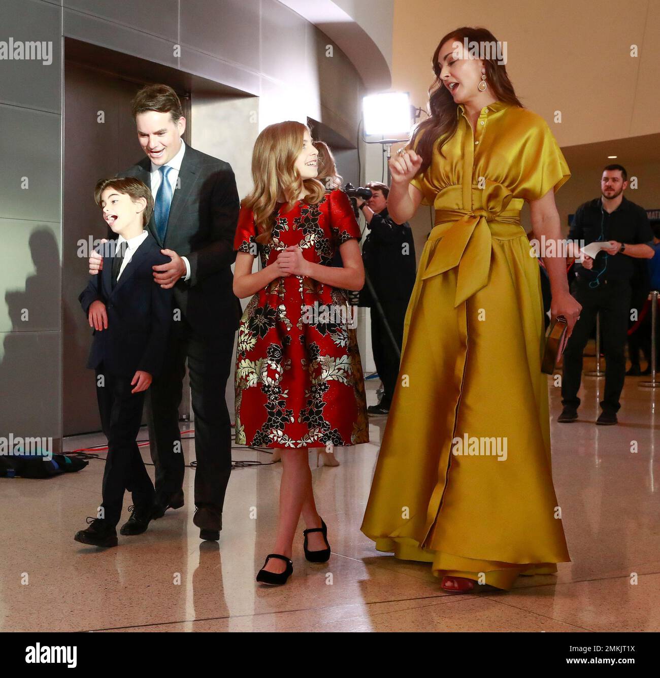 Former NASCAR driver Jeff Gordon, top left, and his family, from left ...