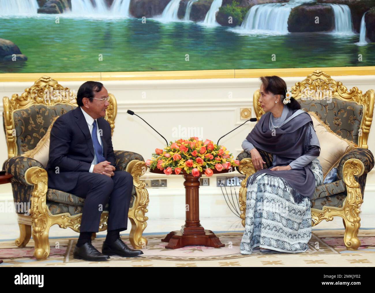 Myanmar's Leader Aung San Suu Kyi, right, speaks with Cambodia's Deputy ...