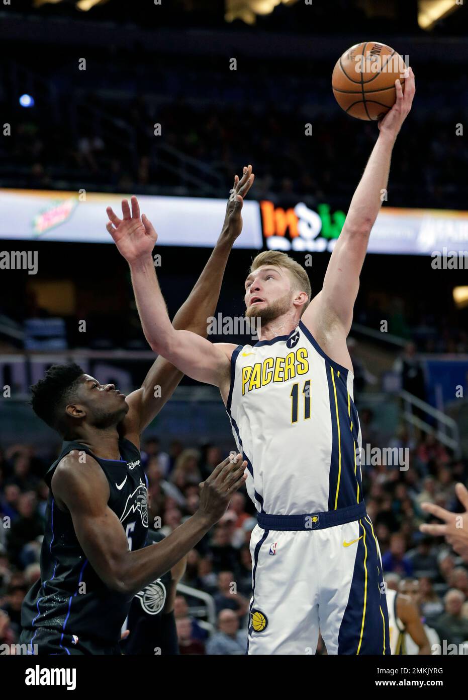 Indiana Pacers' Domantas Sabonis (11) takes a shot over Orlando Magic's ...