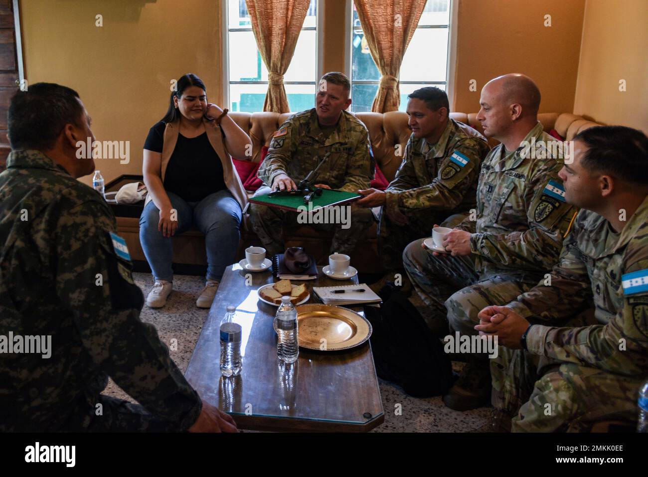 (Far right) Sgt. 1st Class Phillip Flores, and (second from right) Capt ...