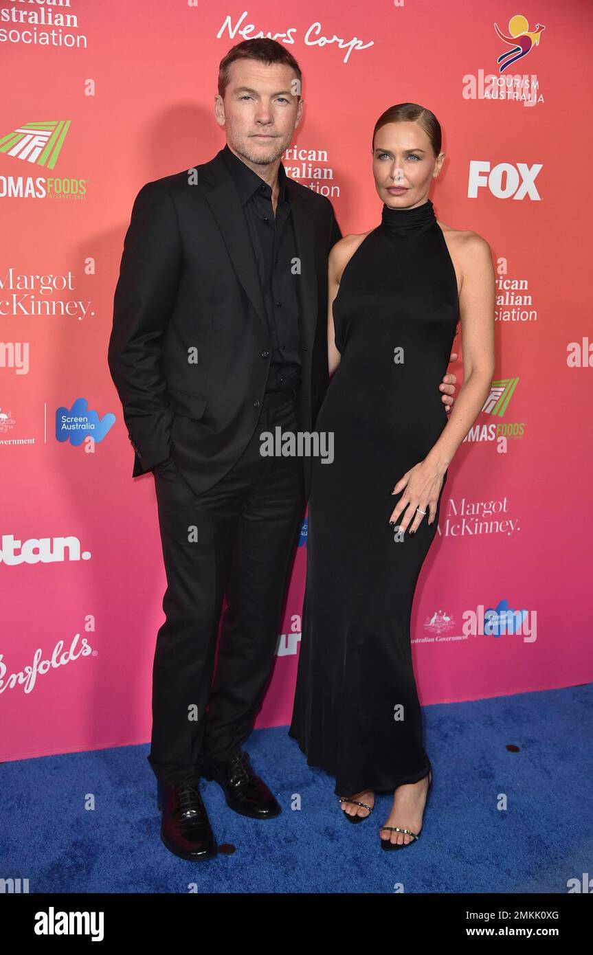 Sam Worthington, left, and Lara Bingle arrive at the G'Day USA Arts ...