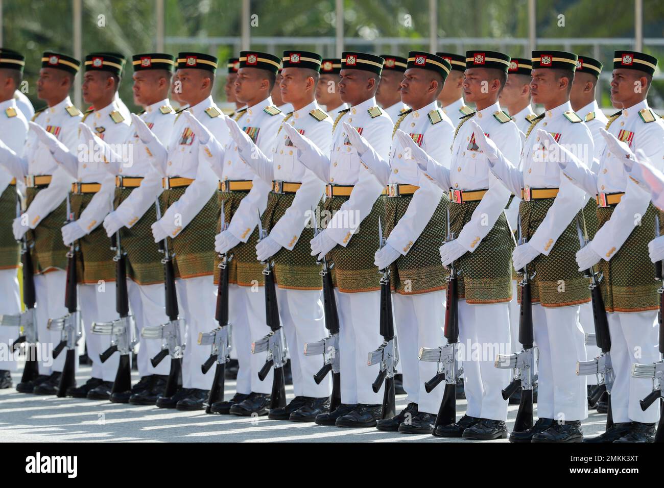 Malaysian Royal Guard prays during a welcome ceremony for King Sultan ...