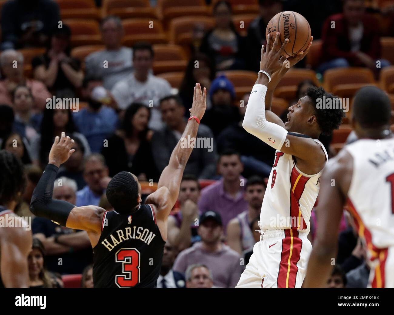 Miami Heat guard Josh Richardson, right, shoots as Chicago Bulls guard ...