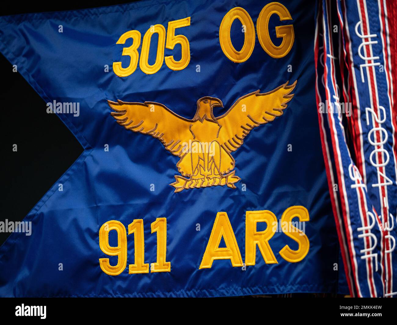 A 911th Air Refueling Squadron guidon is displayed at Seymour Johnson ...