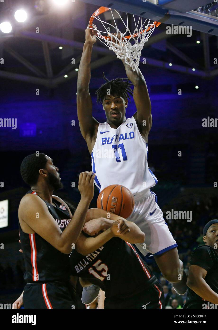 Buffalo forward Jeenathan Williams (11) dunks against Ball State during ...