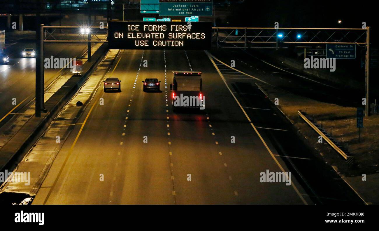 Sparse traffic speed past an electronic highway information sign ...