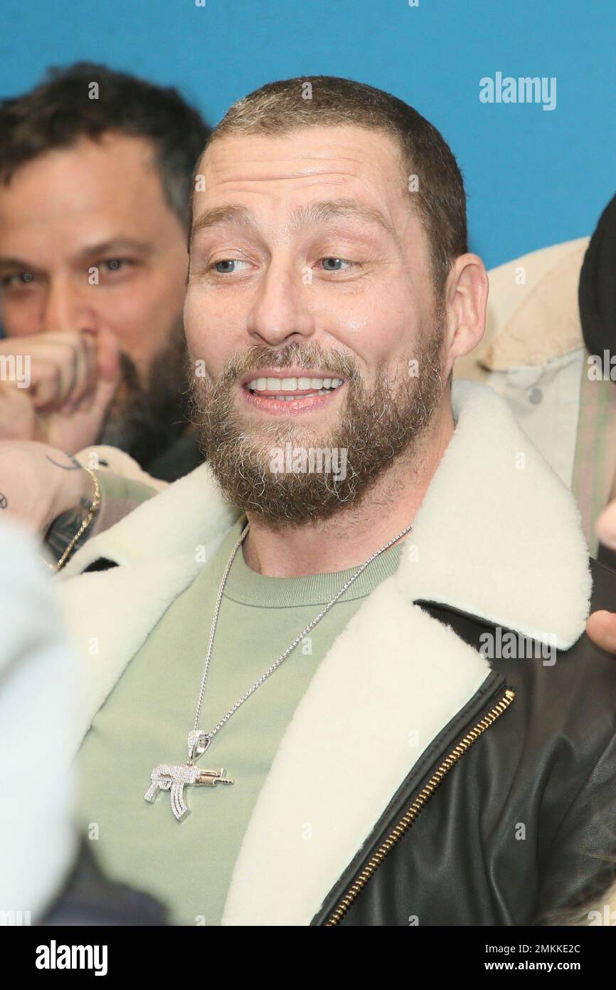 Actor Joseph Vincent Gay gets a machine gun necklace from Pete Davidson ...