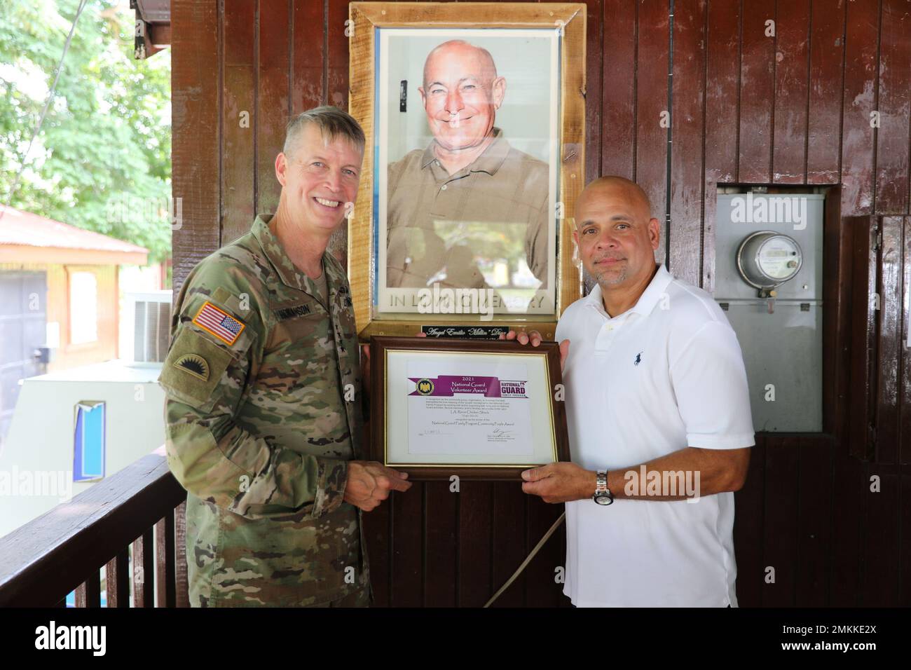 Gen. Daniel Hokanson presents the National Guard Volunteer Award to ...