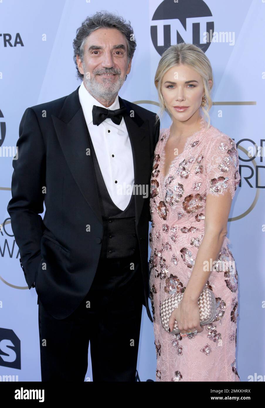 Chuck Lorre, left, and Arielle Mandelson arrive at the 25th annual ...