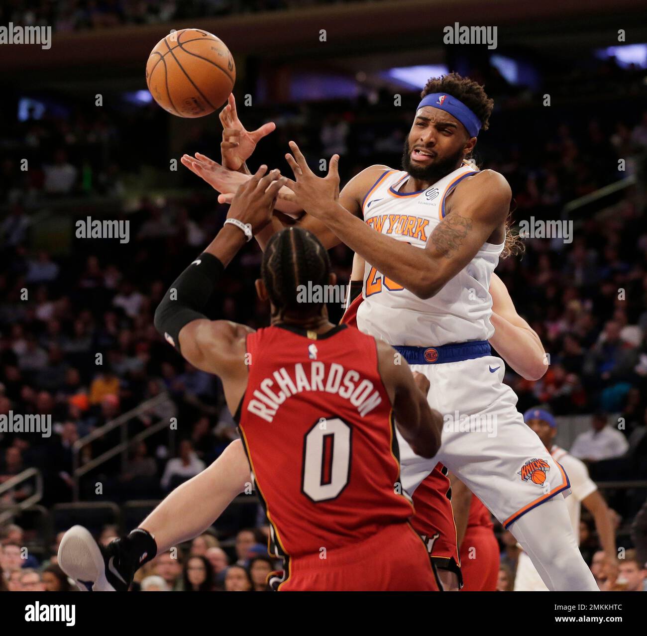 New York Knicks' Mitchell Robinson tries to hold onto the ball during ...