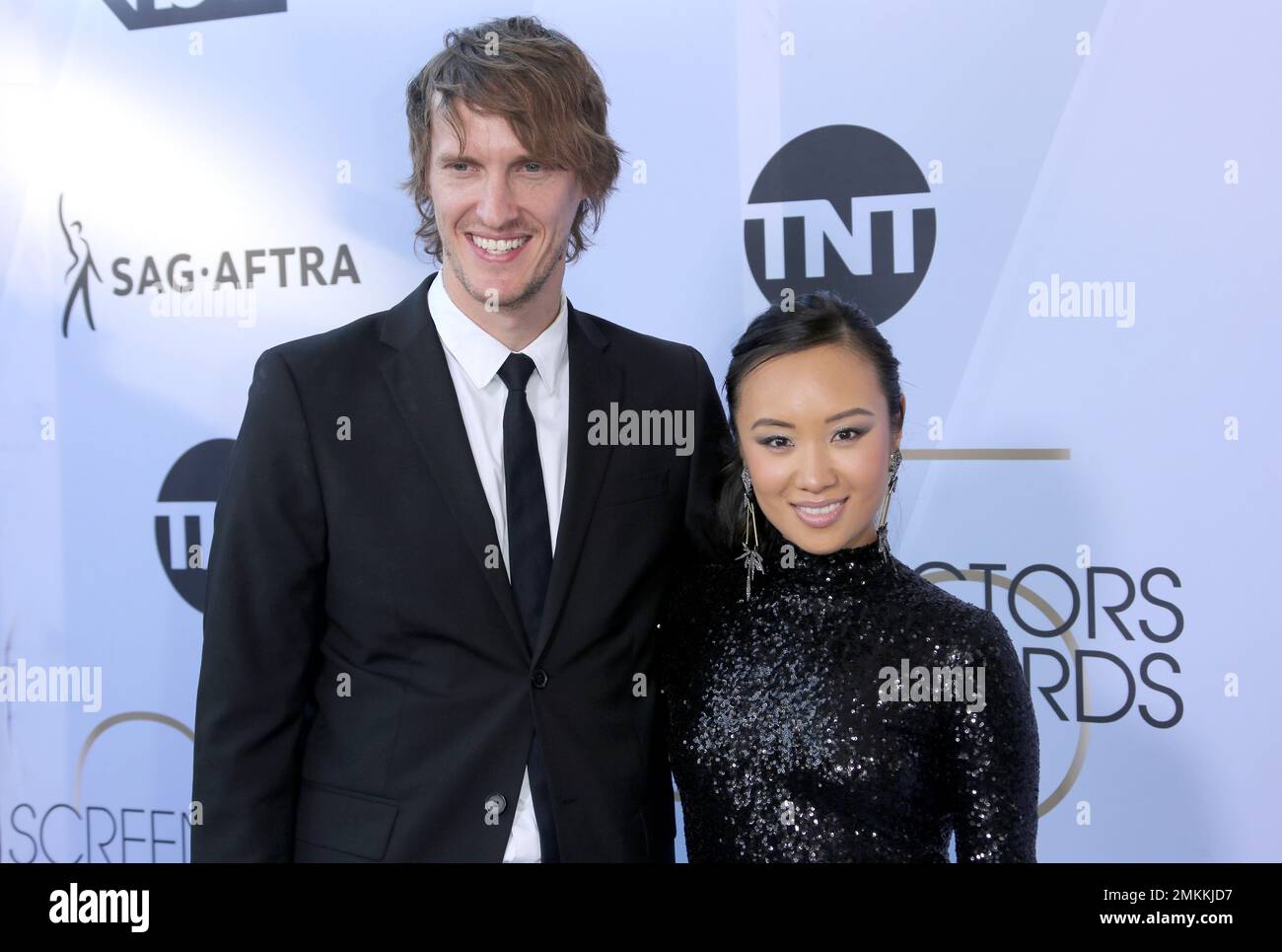 Ellen Wong, right, and Adam Azimov arrive at the 25th annual Screen ...