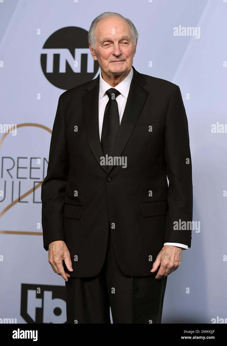 Alan Alda poses with the Life Achievement award in the press room at ...