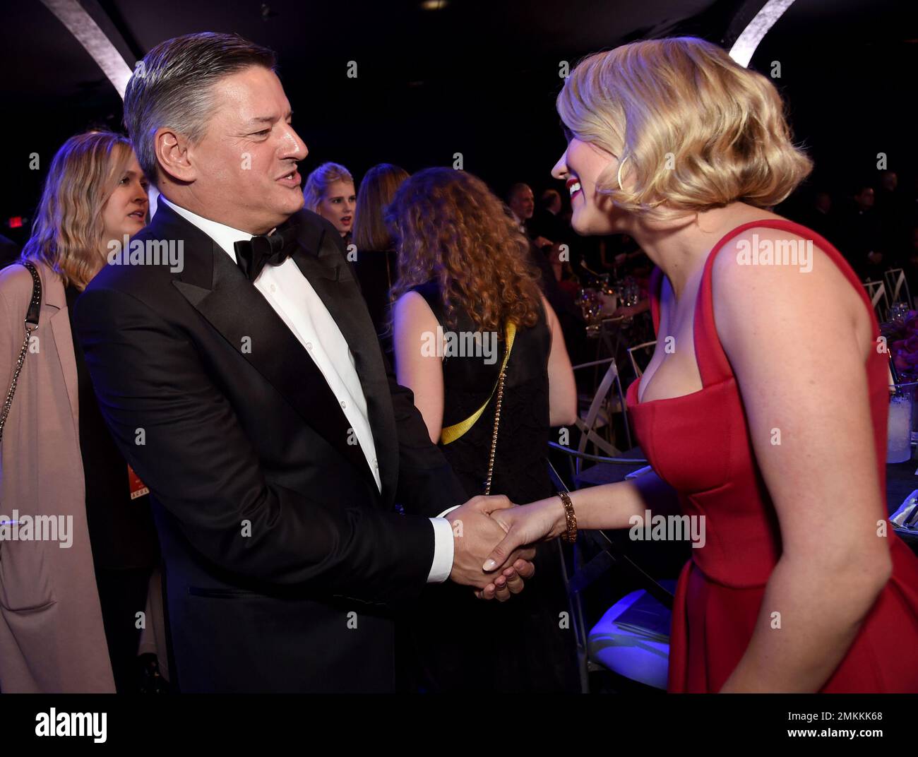 Ted Sarandos, left, and Emily Osment attend the 25th annual Screen ...