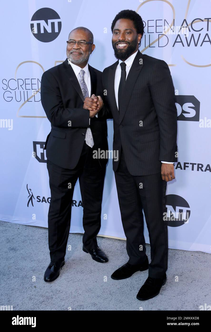 Ron Stallworth, left, and John David Washington arrive at the 25th ...