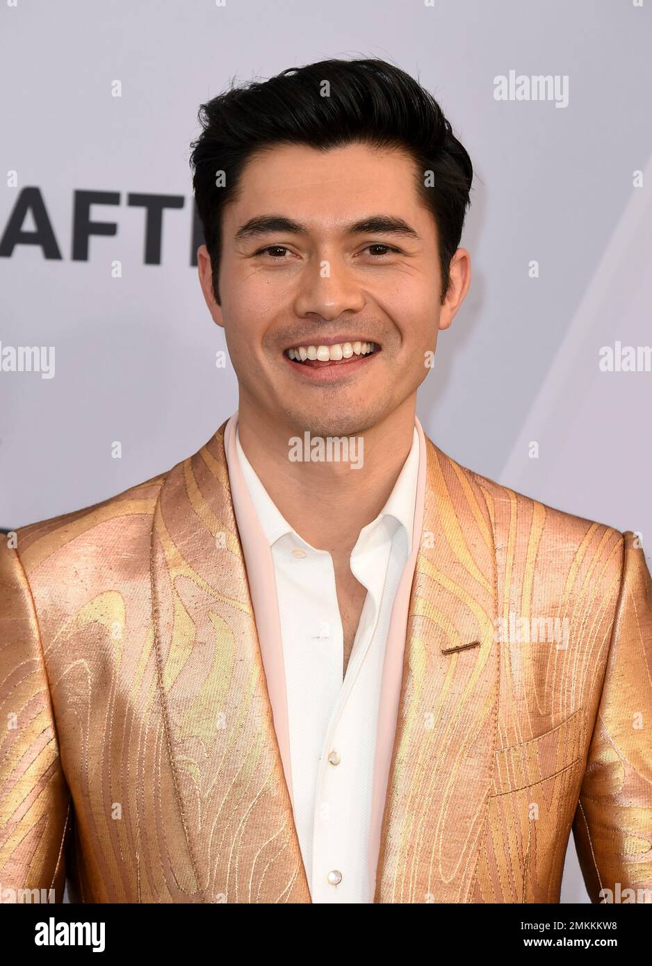 Henry Golding arrives at the 25th annual Screen Actors Guild Awards at ...