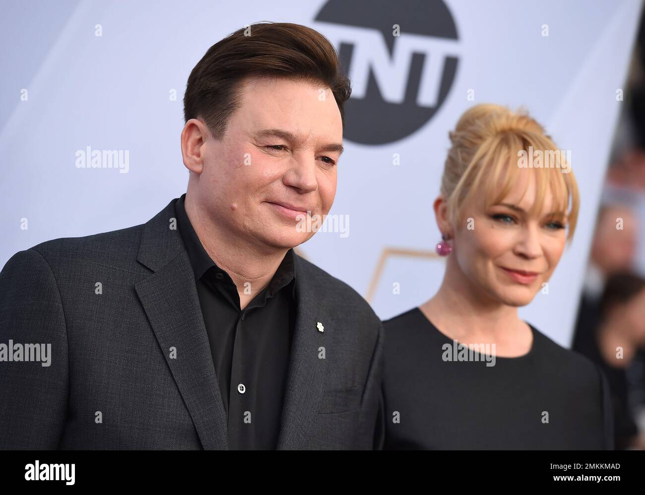 Mike Myers, left, and Kelly Tisdale arrive at the 25th annual Screen ...