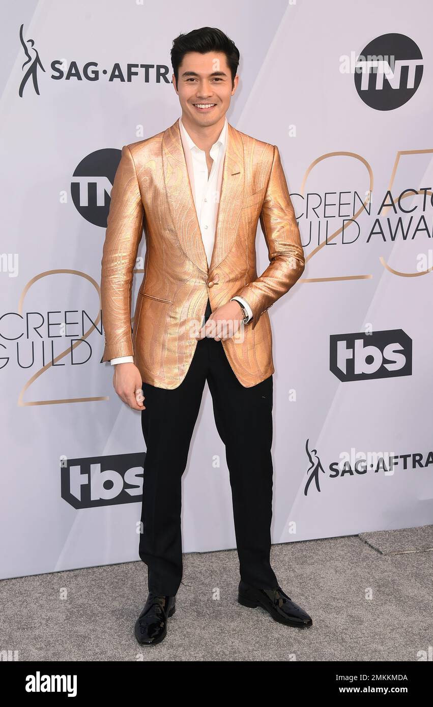 Henry Golding arrives at the 25th annual Screen Actors Guild Awards at ...