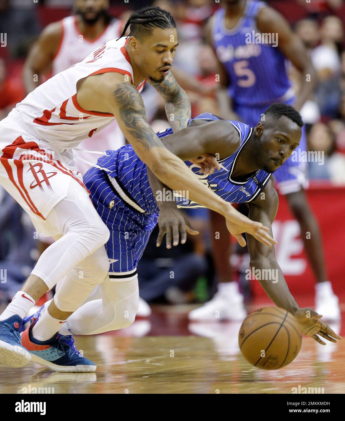 Orlando Magic guard Jerian Grant, right, and Houston Rockets guard ...