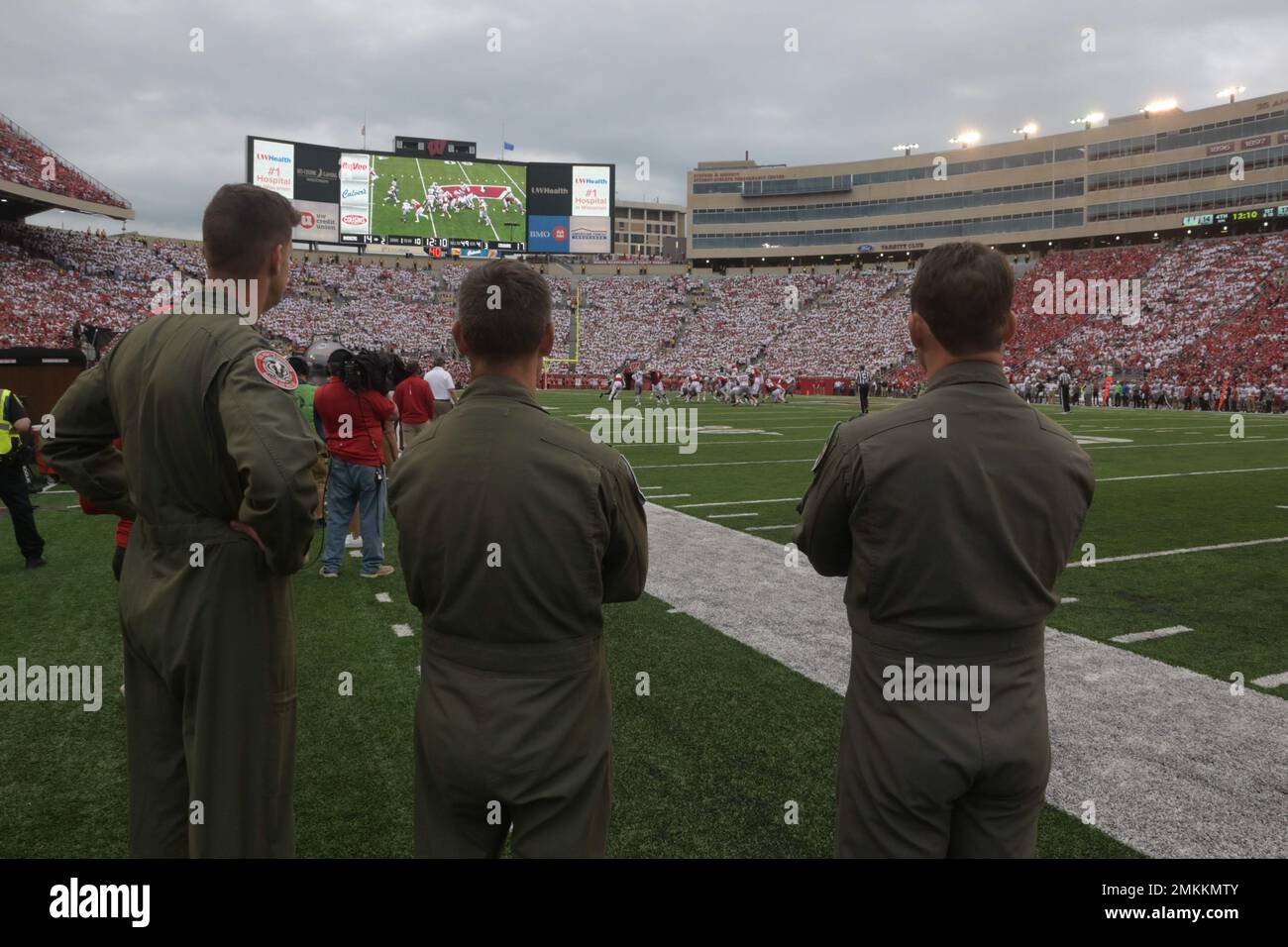 Pilots assigned to the 115th Fighter Wing take part in a flyover during ...