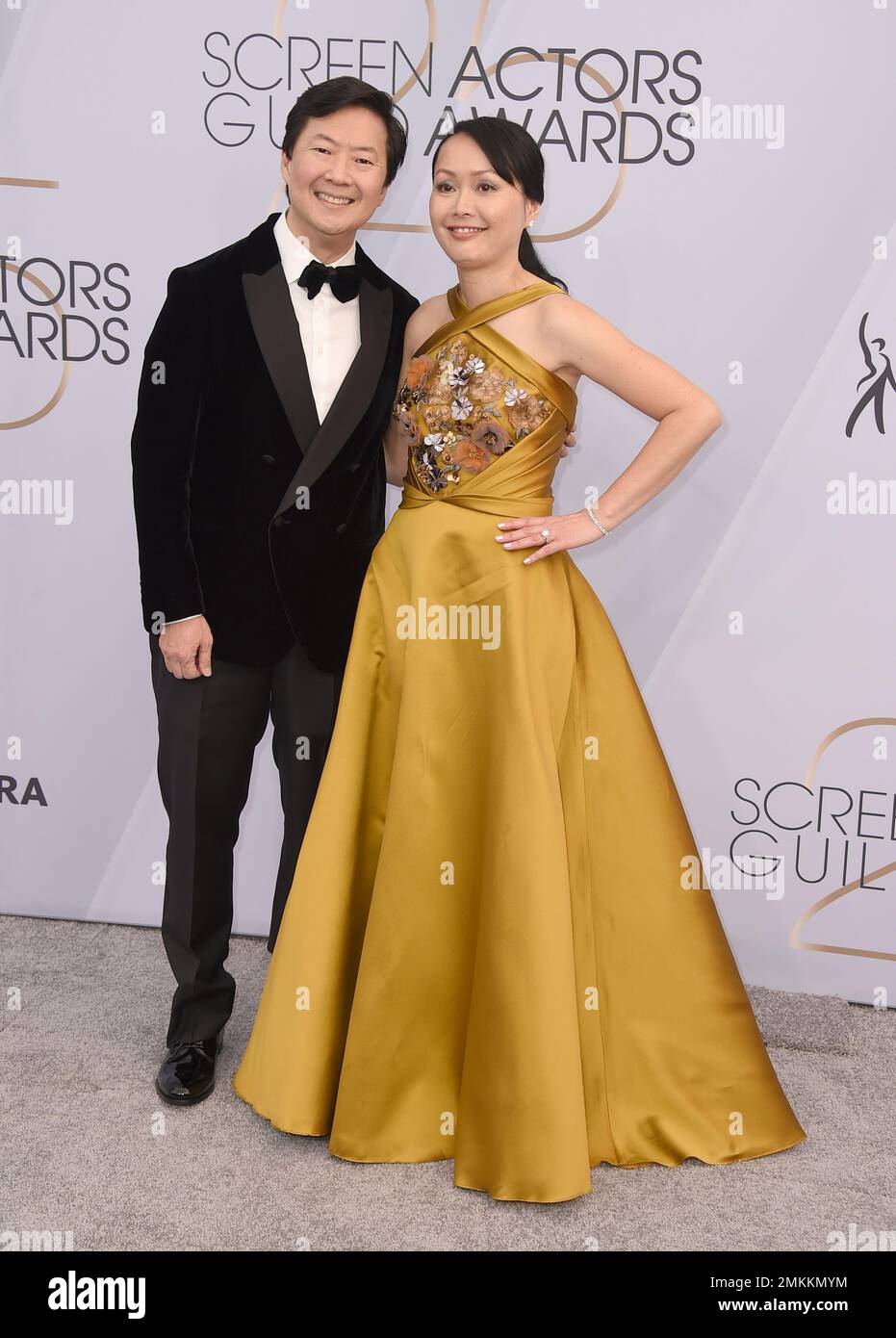 Ken Jeong, left, and Tran Jeong arrive at the 25th annual Screen Actors ...