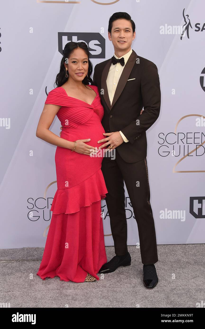 Shelby Rabara, left, and Harry Shum Jr. arrive at the 25th annual ...