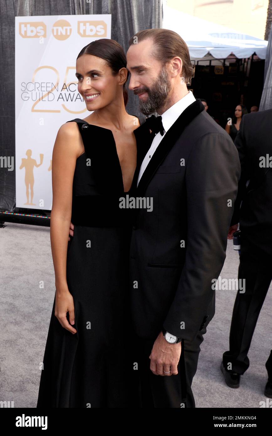 Maria Dolores Dieguez, left, and Joseph Fiennes arrive at the 25th ...