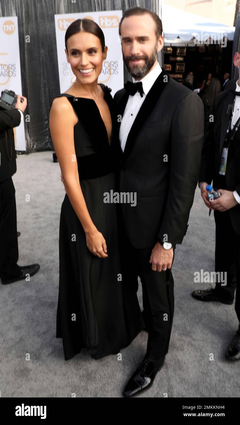Maria Dolores Dieguez, left, and Joseph Fiennes arrive at the 25th ...