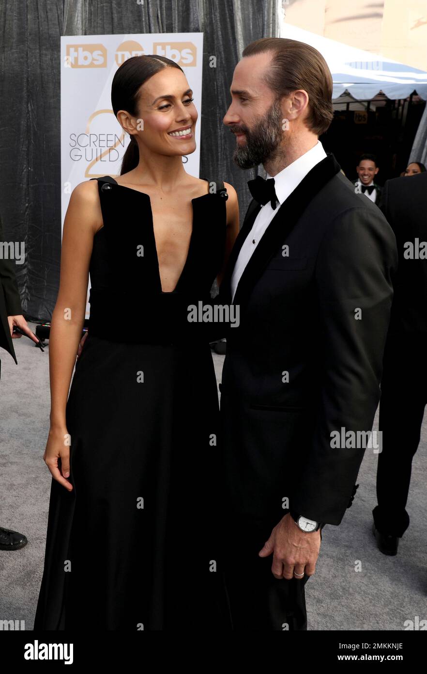 Maria Dolores Dieguez, left, and Joseph Fiennes arrive at the 25th ...